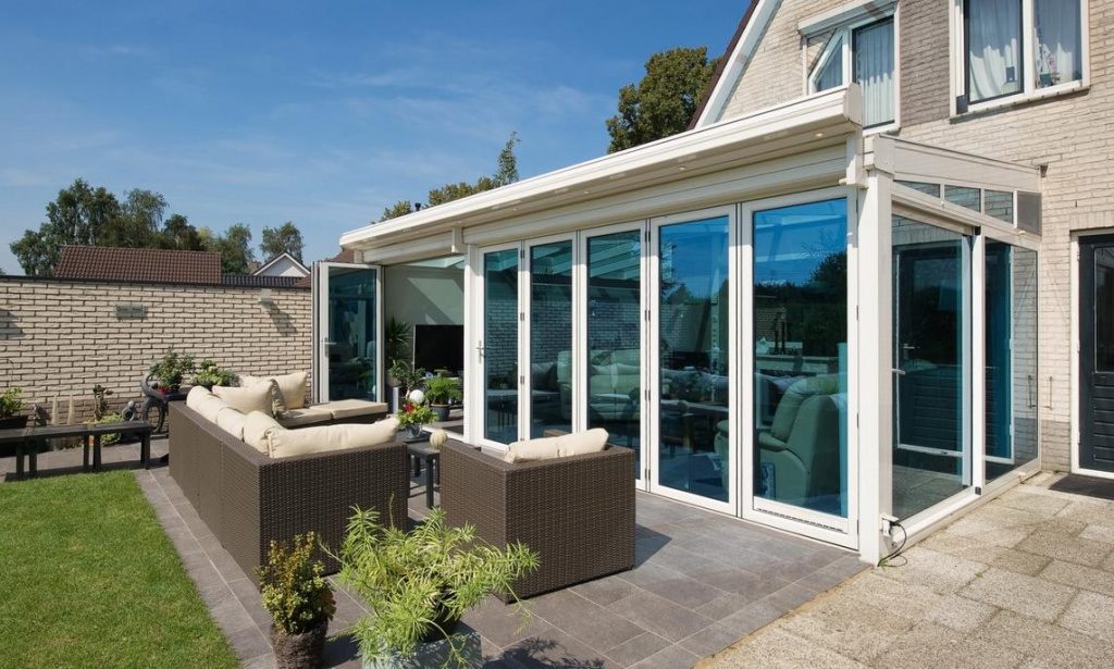 Serre aanbouw | Hout, kunstof en Glas - De Aanbouw Expert
